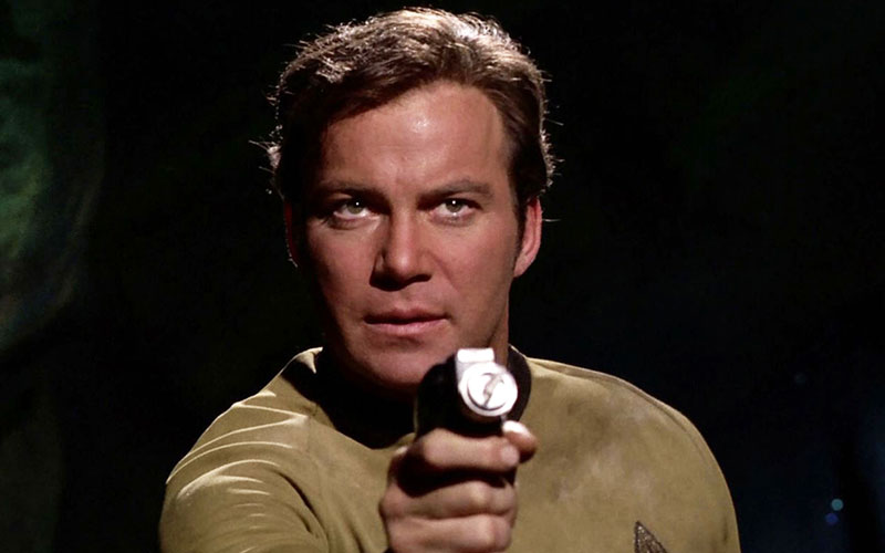 Captain James T. Kirk wielding his phaser | TREKNEWS.NET | Your daily ...